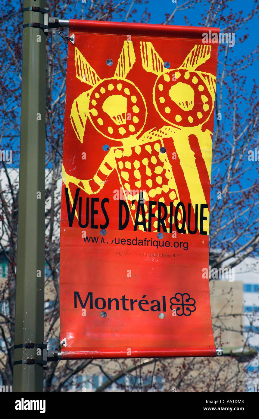 A brightly coloured street sign for the Vues d'Afrique festival in a ...