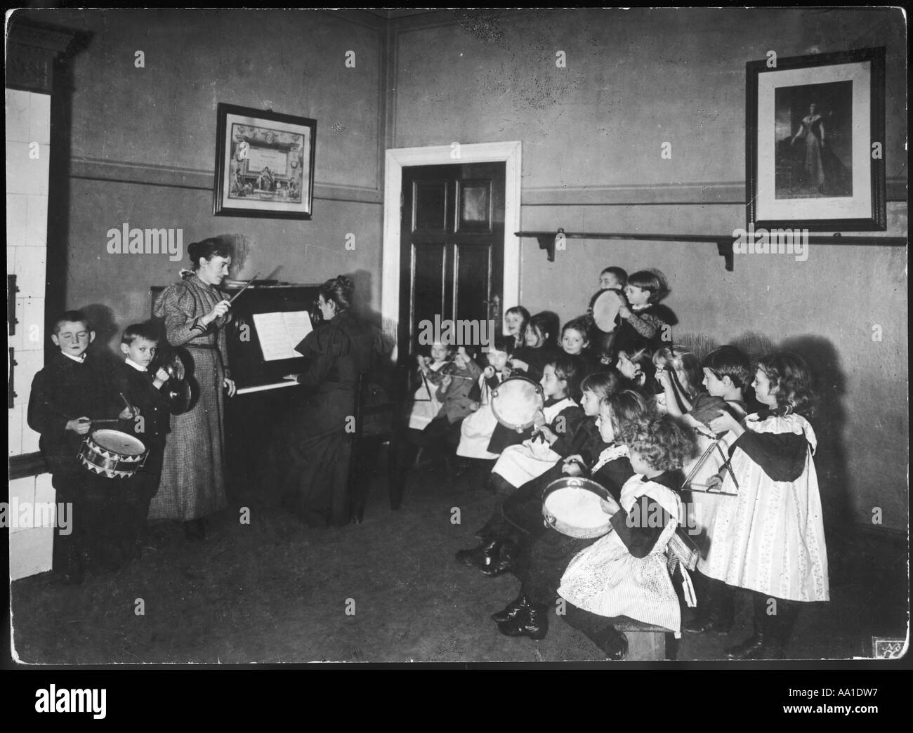 Music teacher plays hi-res stock photography and images - Alamy