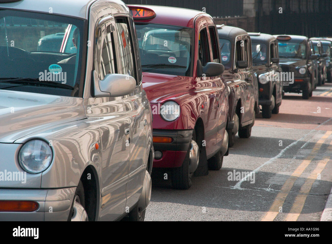 London licensed taxi black cabs taxis Stock Photo - Alamy