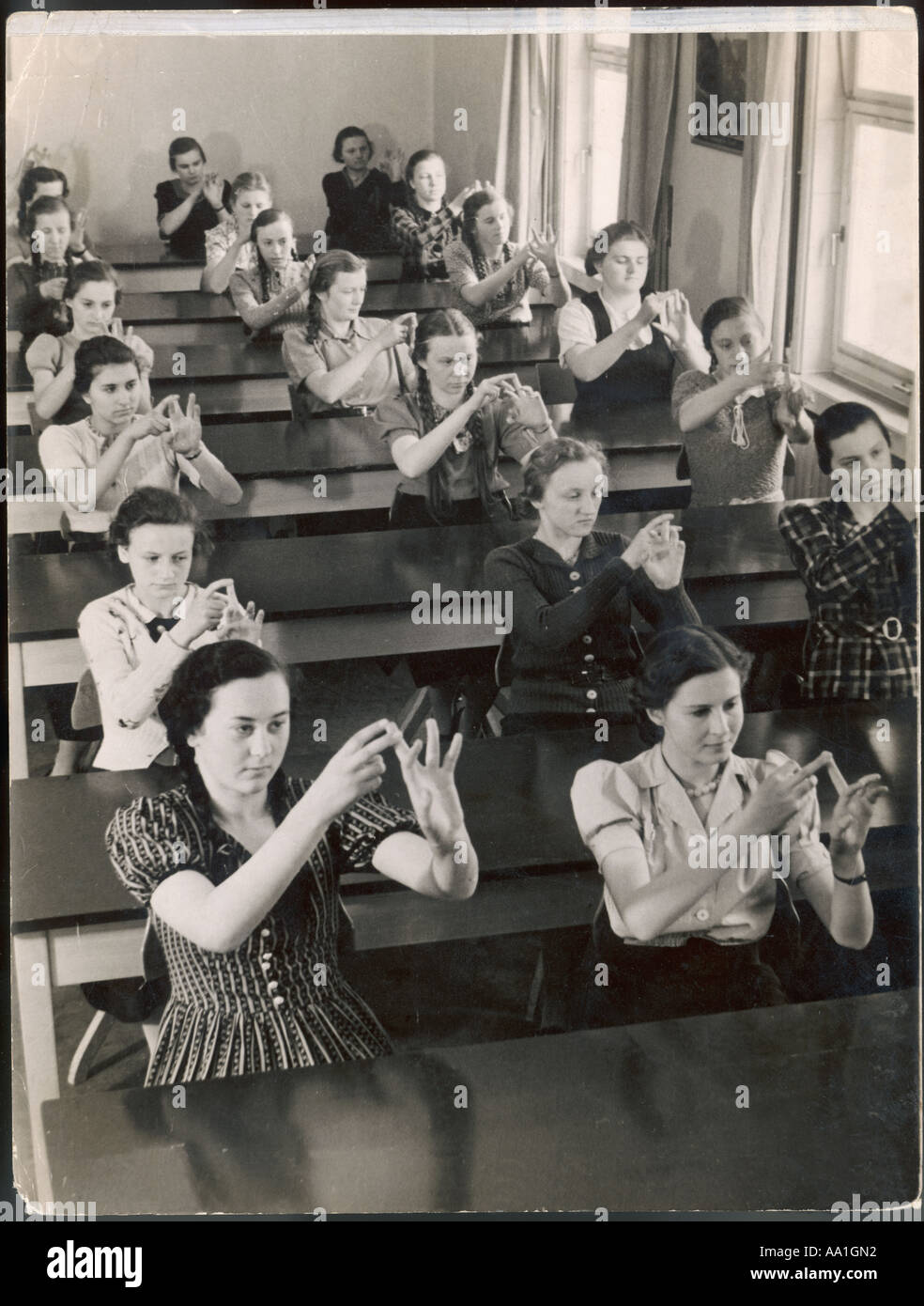 Deaf children learning sign language hi-res stock photography and ...