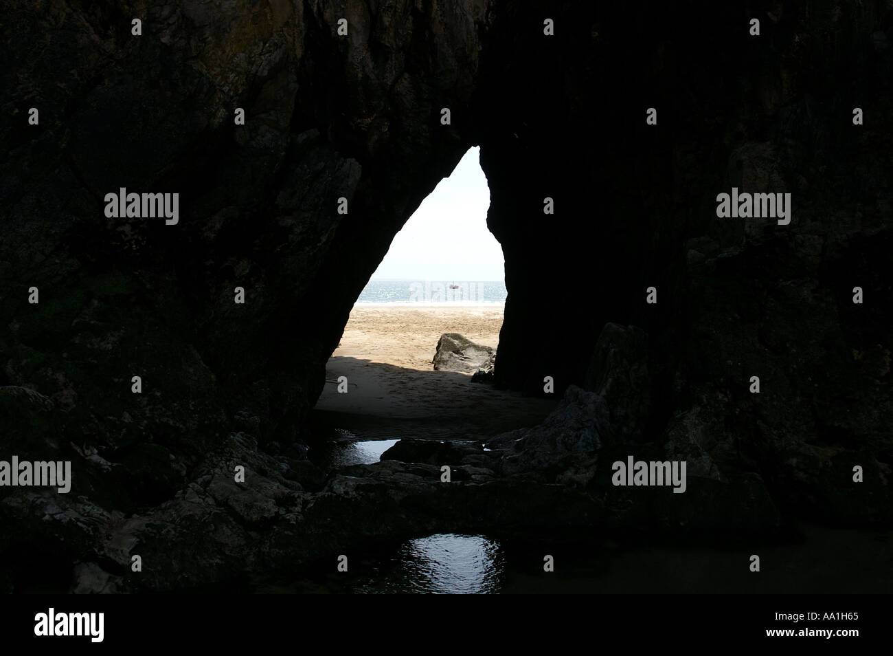 Hole through cliff Pobble beach Mumbles South Gower peninsula Glamorgan ...