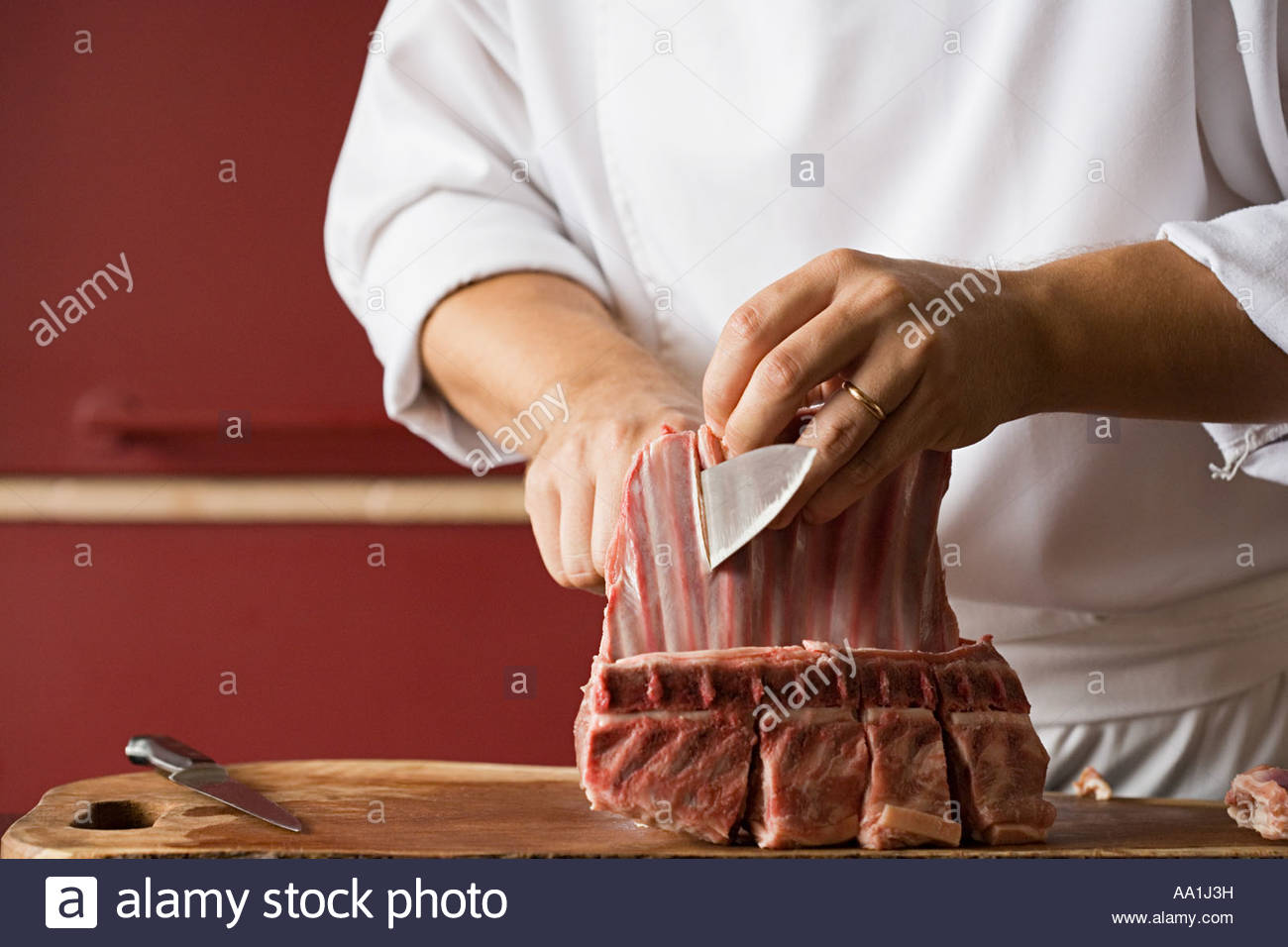 Man Cutting Meat Stock Photos & Man Cutting Meat Stock Images - Alamy