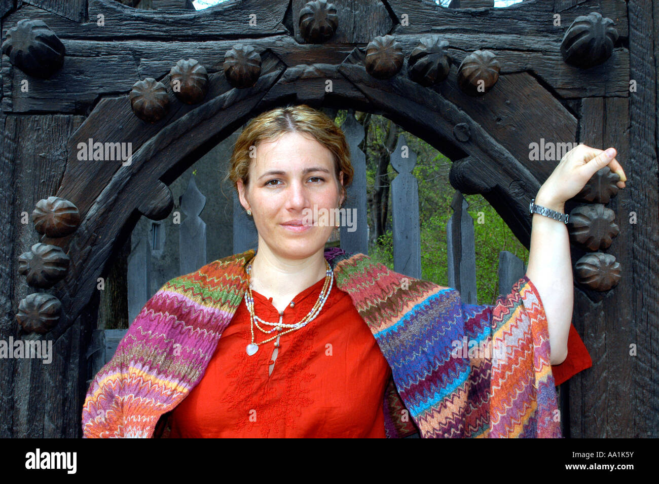 womans portrait in fron of a transylvanian gate Stock Photo - Alamy
