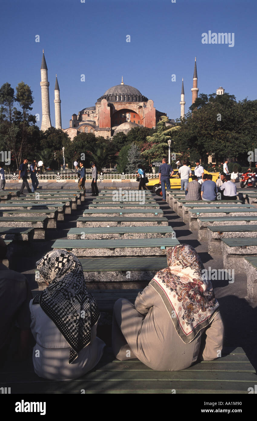 ISTANBUL. Two traditionally-attired Turkish women sitting and ...
