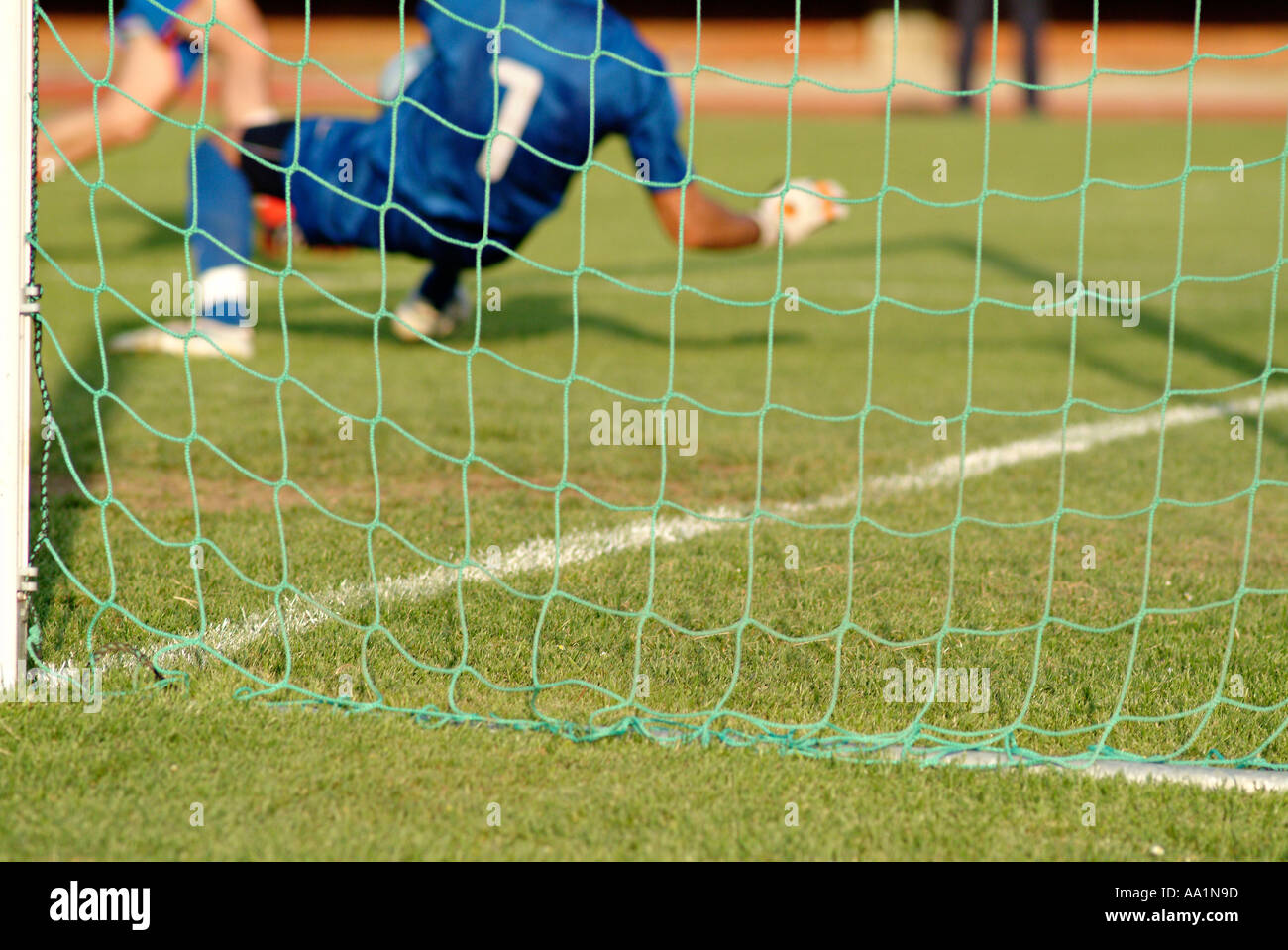 Football dives hi-res stock photography and images - Alamy