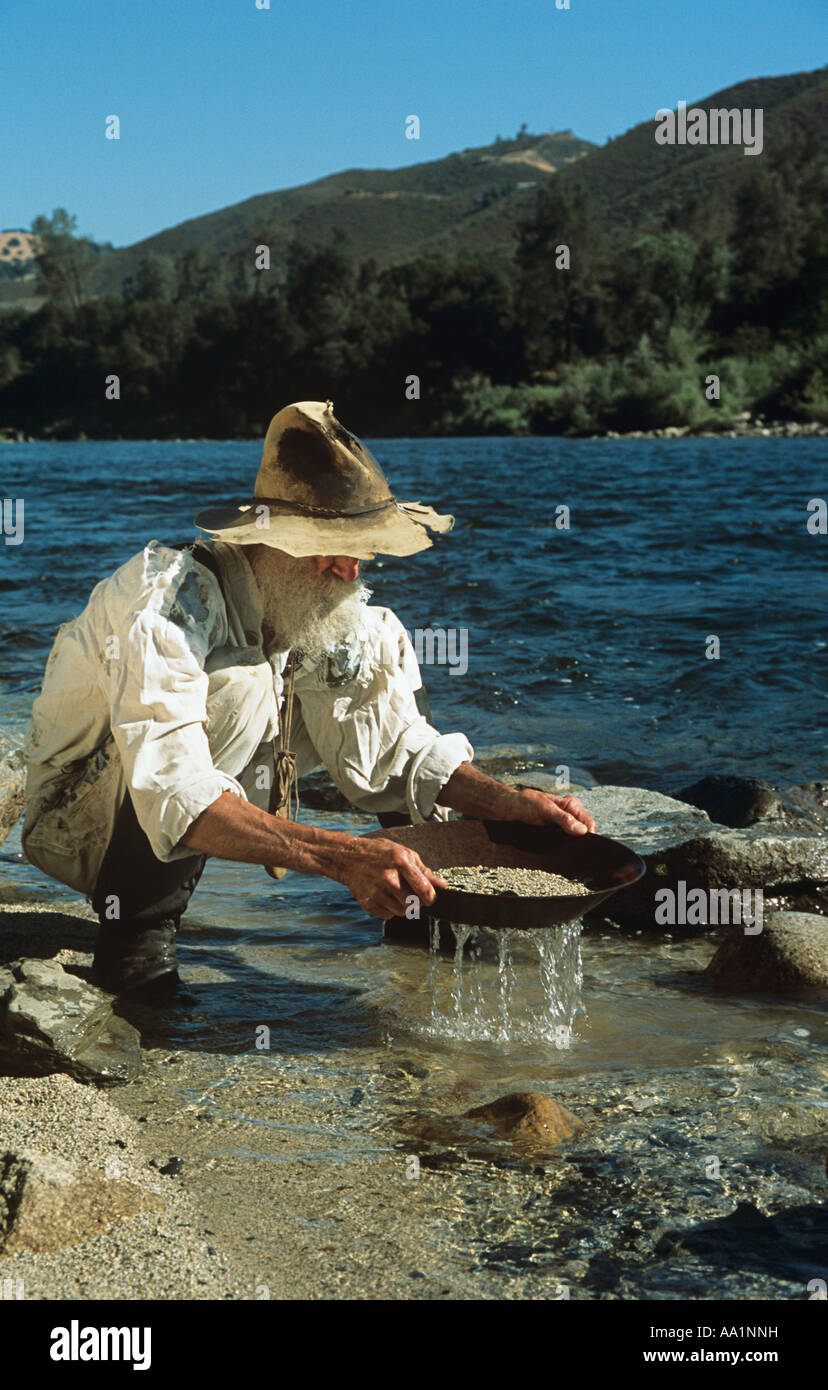 Man panning for gold Stock Photo - Alamy
