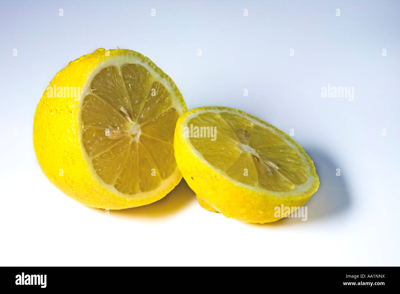 A cut lemon Stock Photo - Alamy