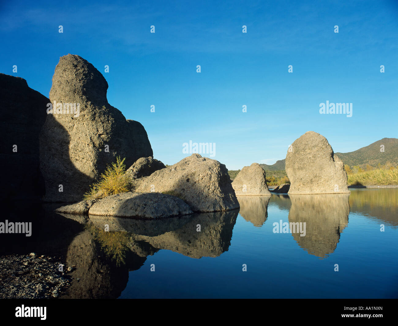 Rocks in water Stock Photo - Alamy