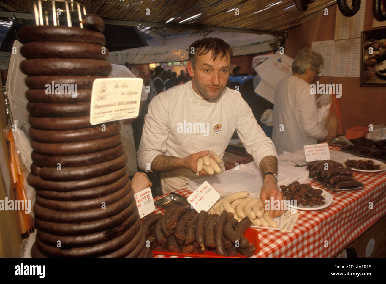 Market stall trader Black Puddings (Boudin Noir) food fair fete ...