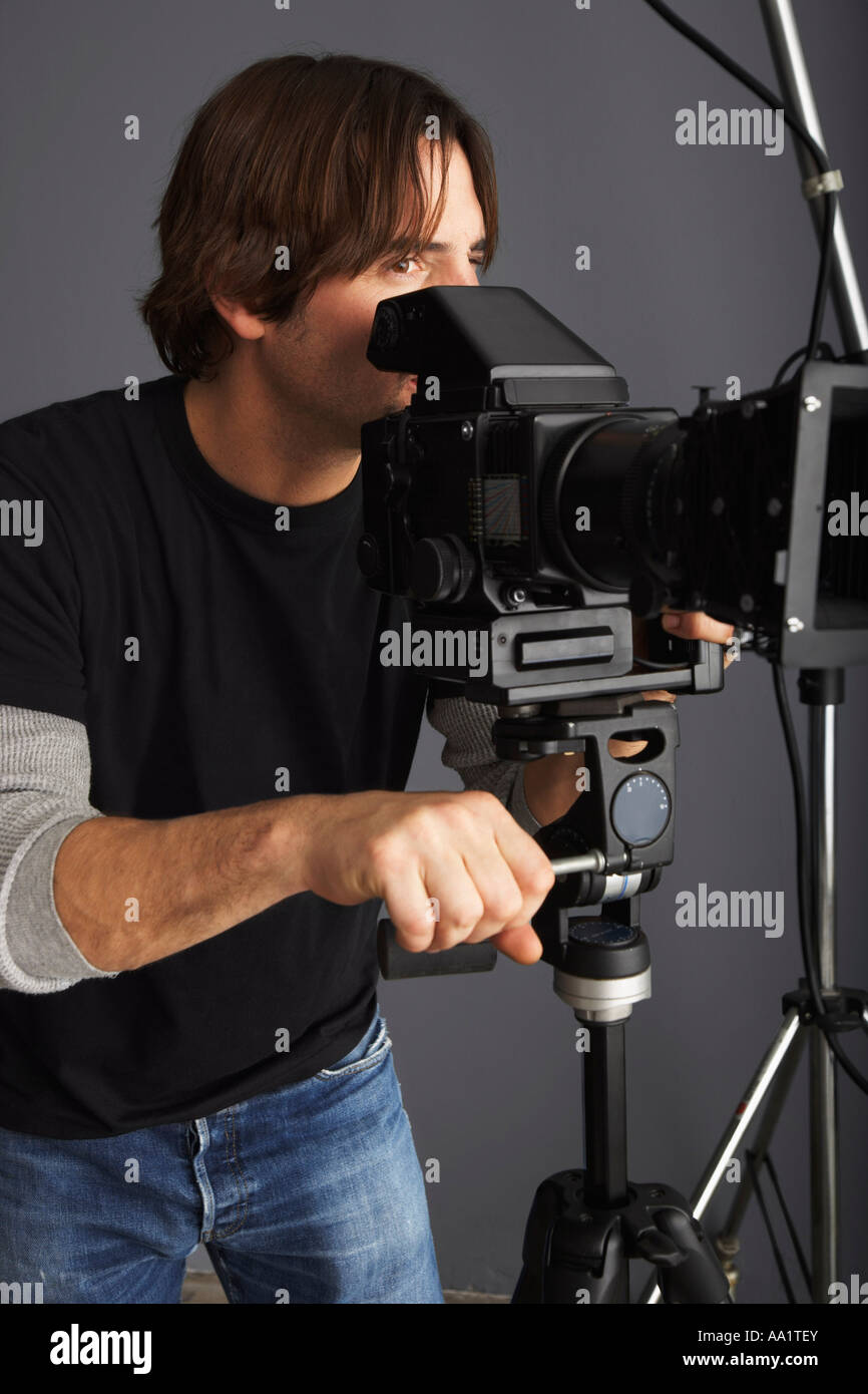 Taking photograph hiding hi-res stock photography and images - Alamy