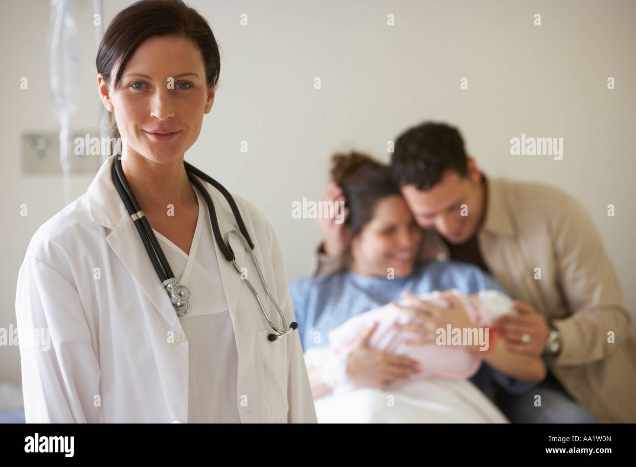 Deliver baby doctor father and mother hi-res stock photography and ...