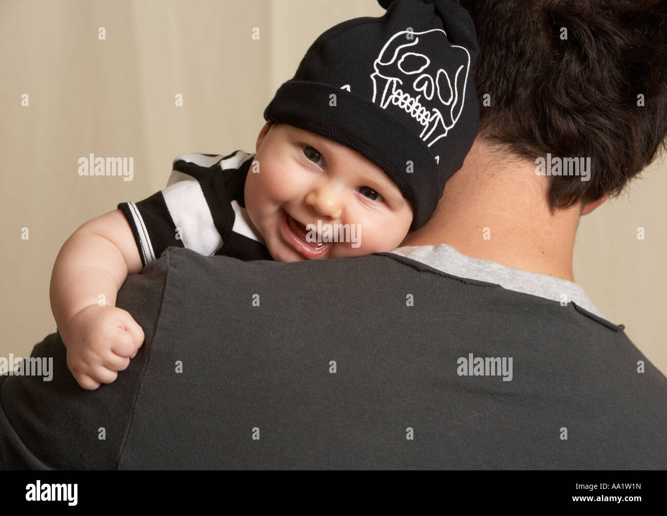 Father carrying son over shoulder hi-res stock photography and images ...