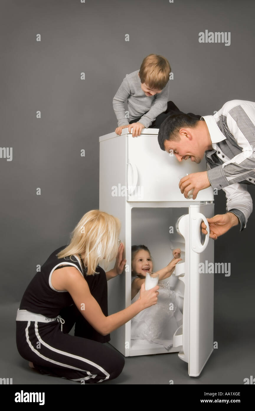 Family and fridge Stock Photo - Alamy