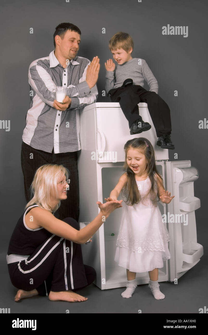 Family and fridge Stock Photo - Alamy