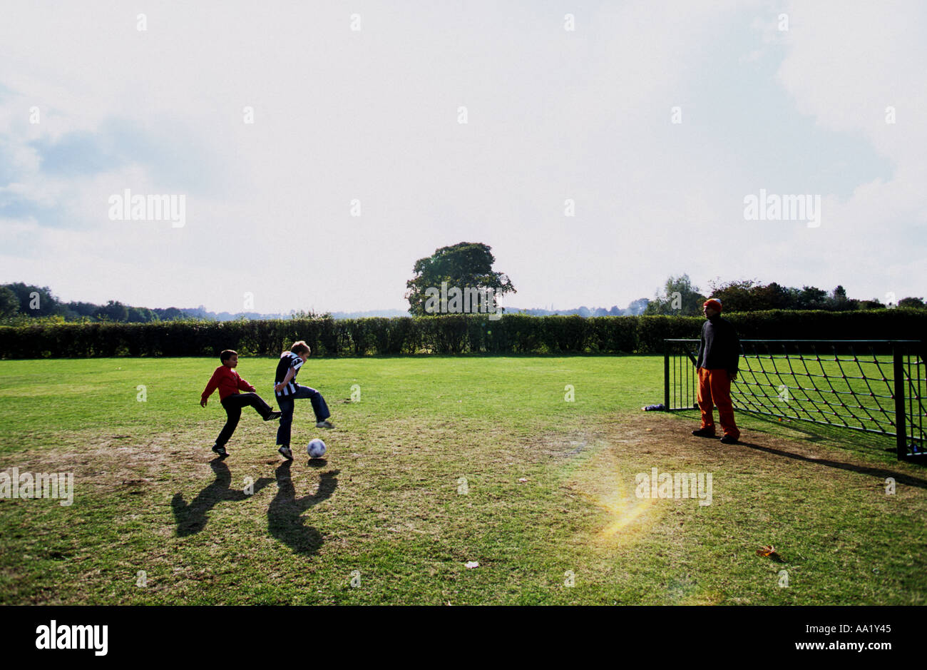 Children playing football uk hi-res stock photography and images - Alamy