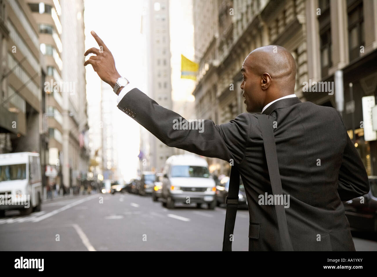 Man Hailing Taxi Stock Photo - Alamy