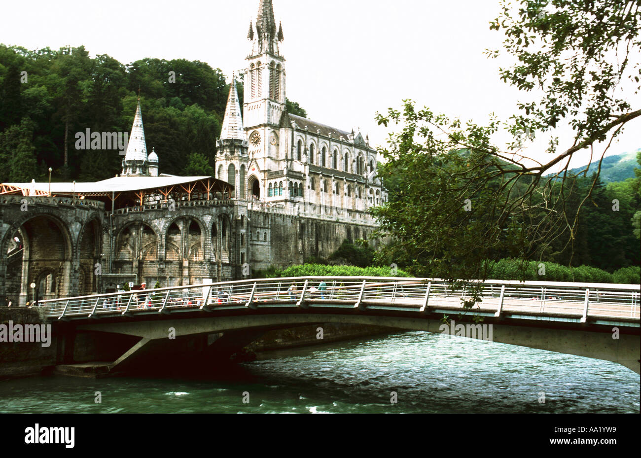 France, Lourdes, our Lady of Lourdes Basilica by river Stock Photo - Alamy