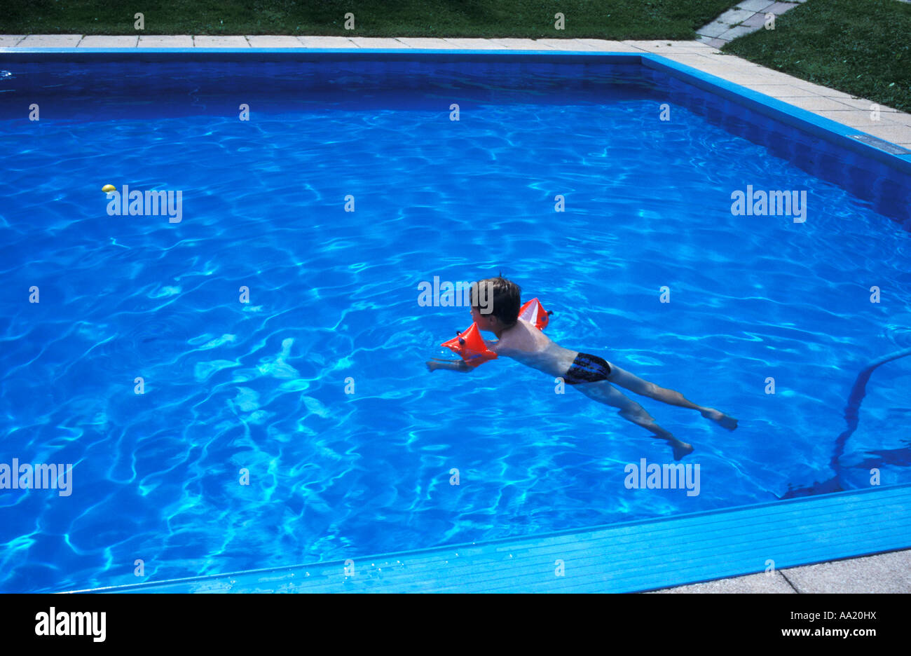 Floating in a Swimming Pool Stock Photo - Alamy