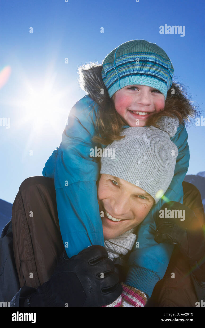 Giving daughter shoulder ride hi-res stock photography and images - Alamy