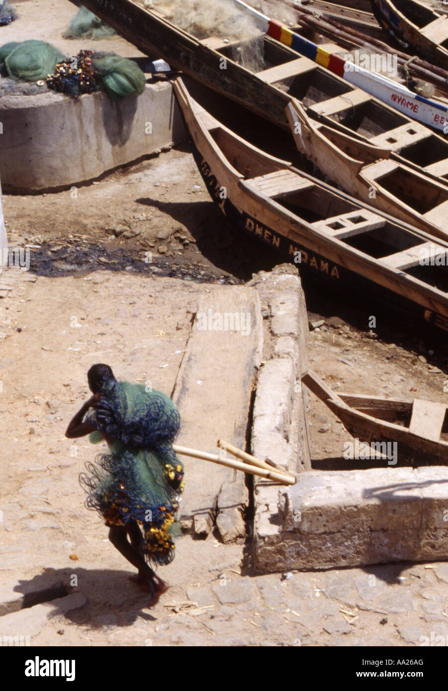 Bringing in fishing nets from the boats at Cape Coast, Ghana Stock ...