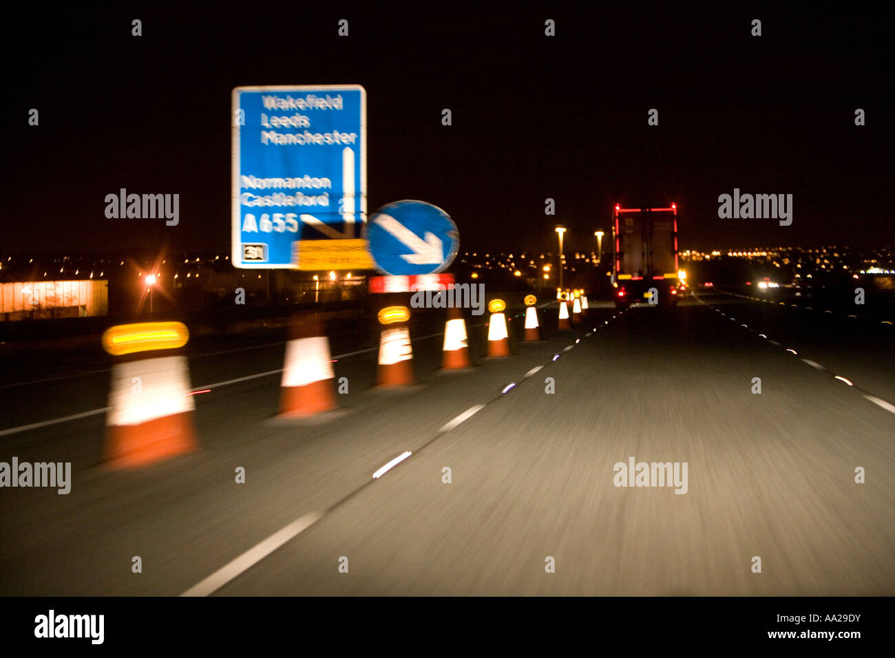 Traffic at night and roadworks on UK motorway England abstract Stock ...
