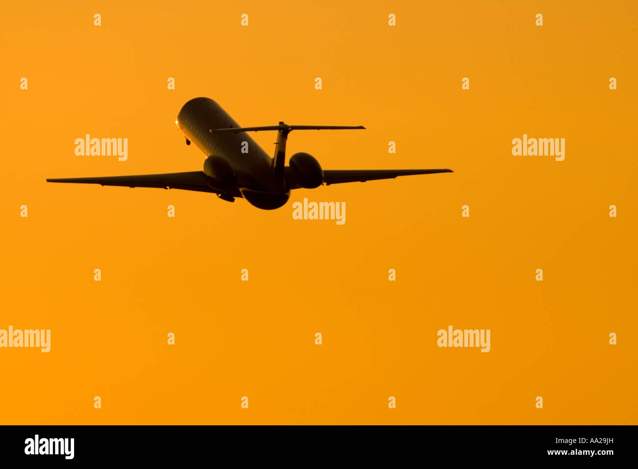 Business jet yellow sky Stock Photo - Alamy