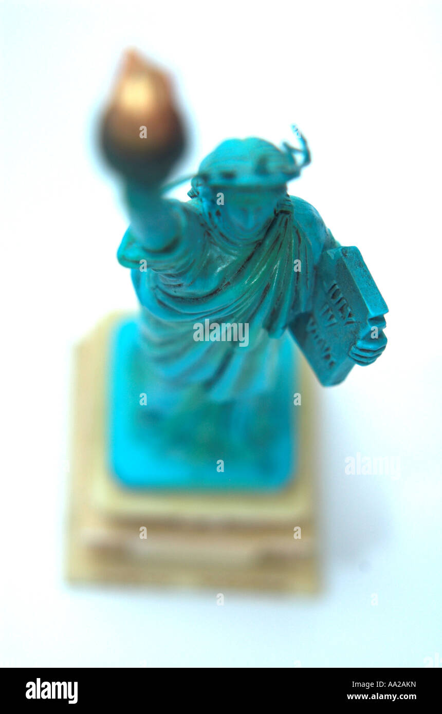 overhead view of minature statue of liberty against white background ...