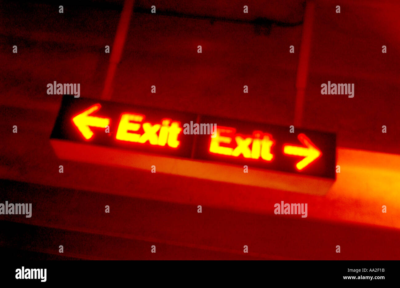 Abstract horizontal color image of exit signs in parking deck Stock ...