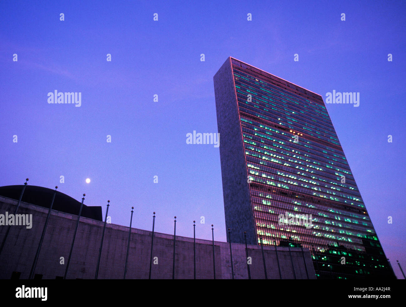 New York City United Nations Secretariat building at night. International UN headquarters in New ...