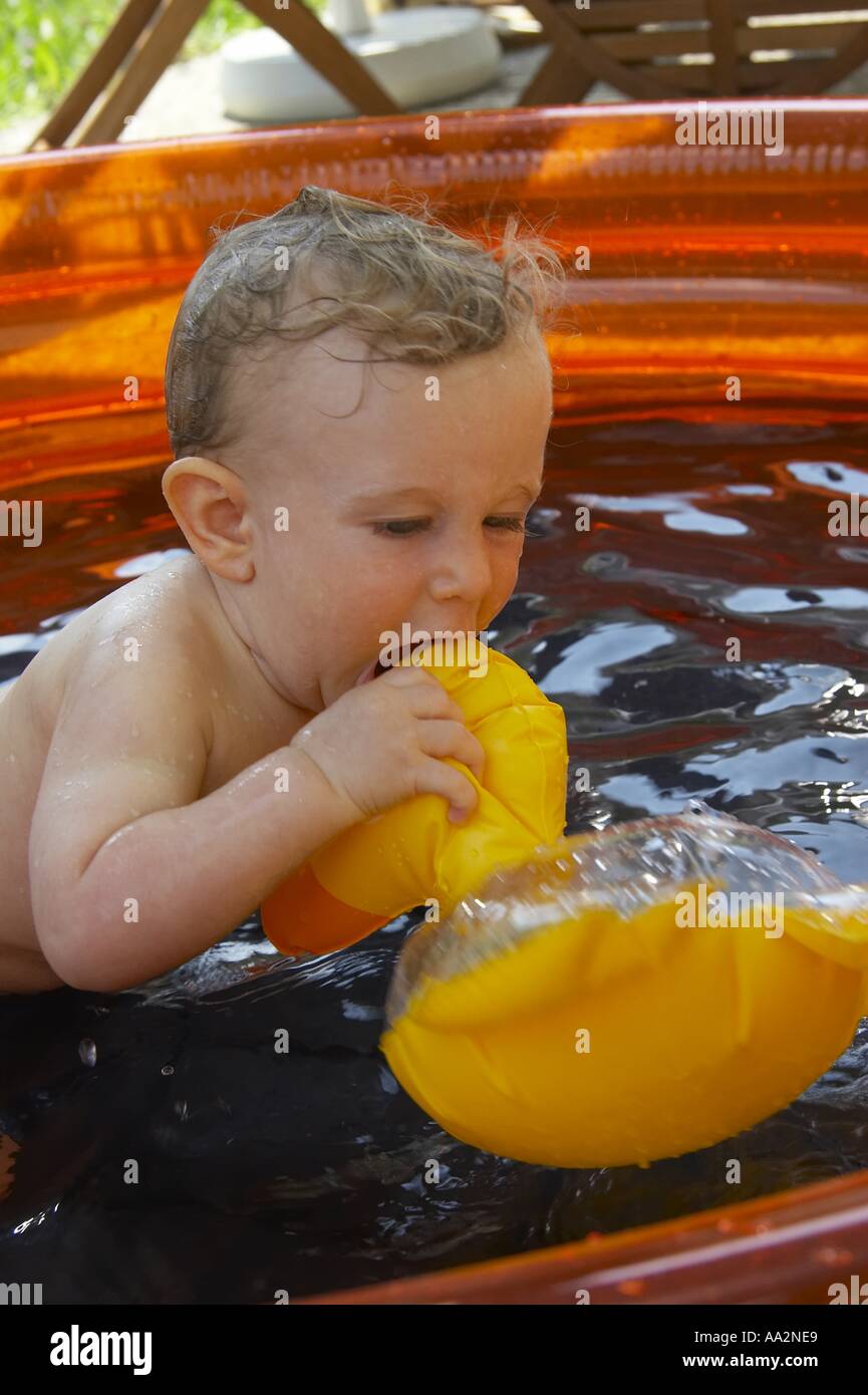 baby in wading pool Stock Photo - Alamy