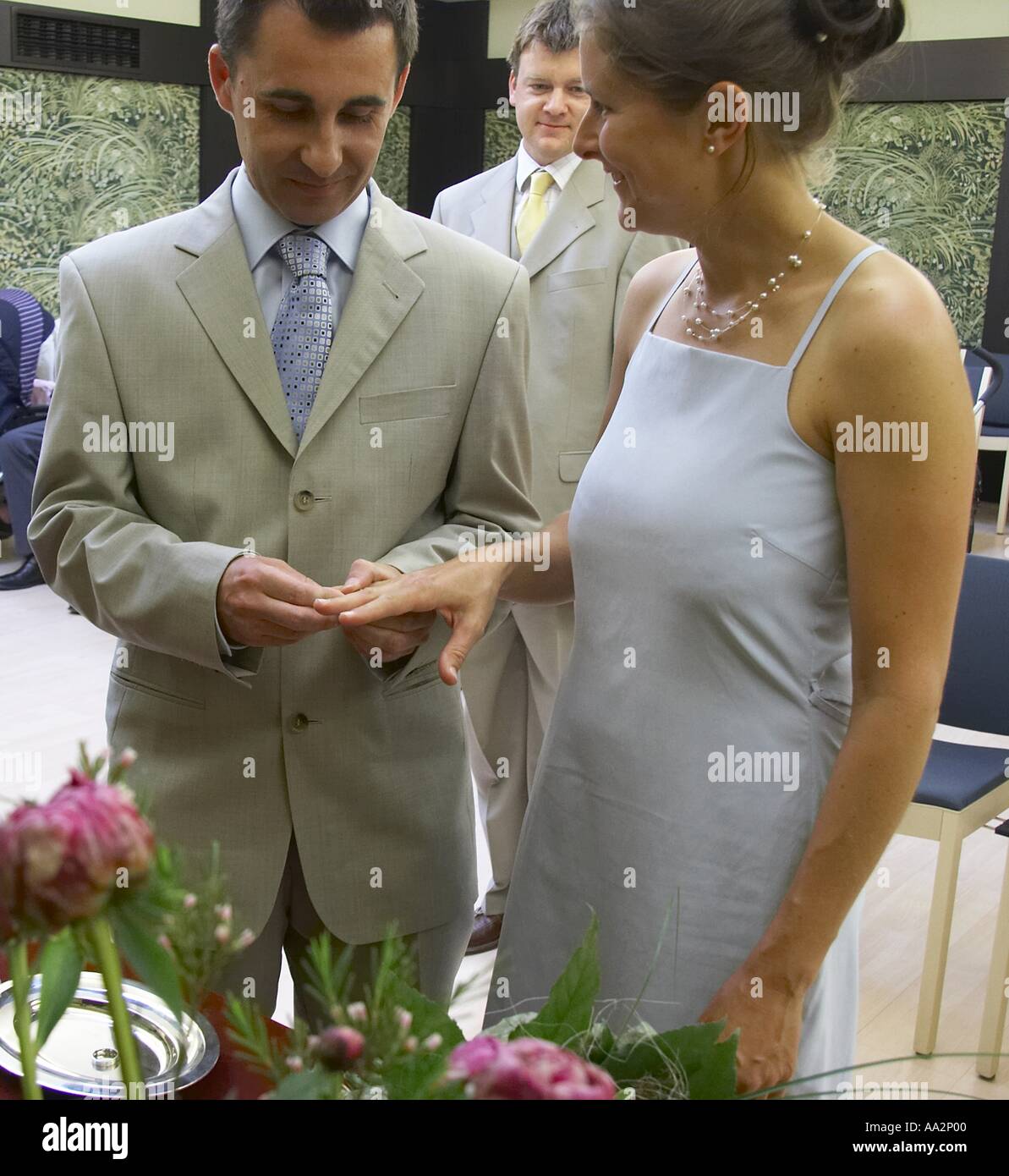 bridal couple exchanging rings Stock Photo - Alamy