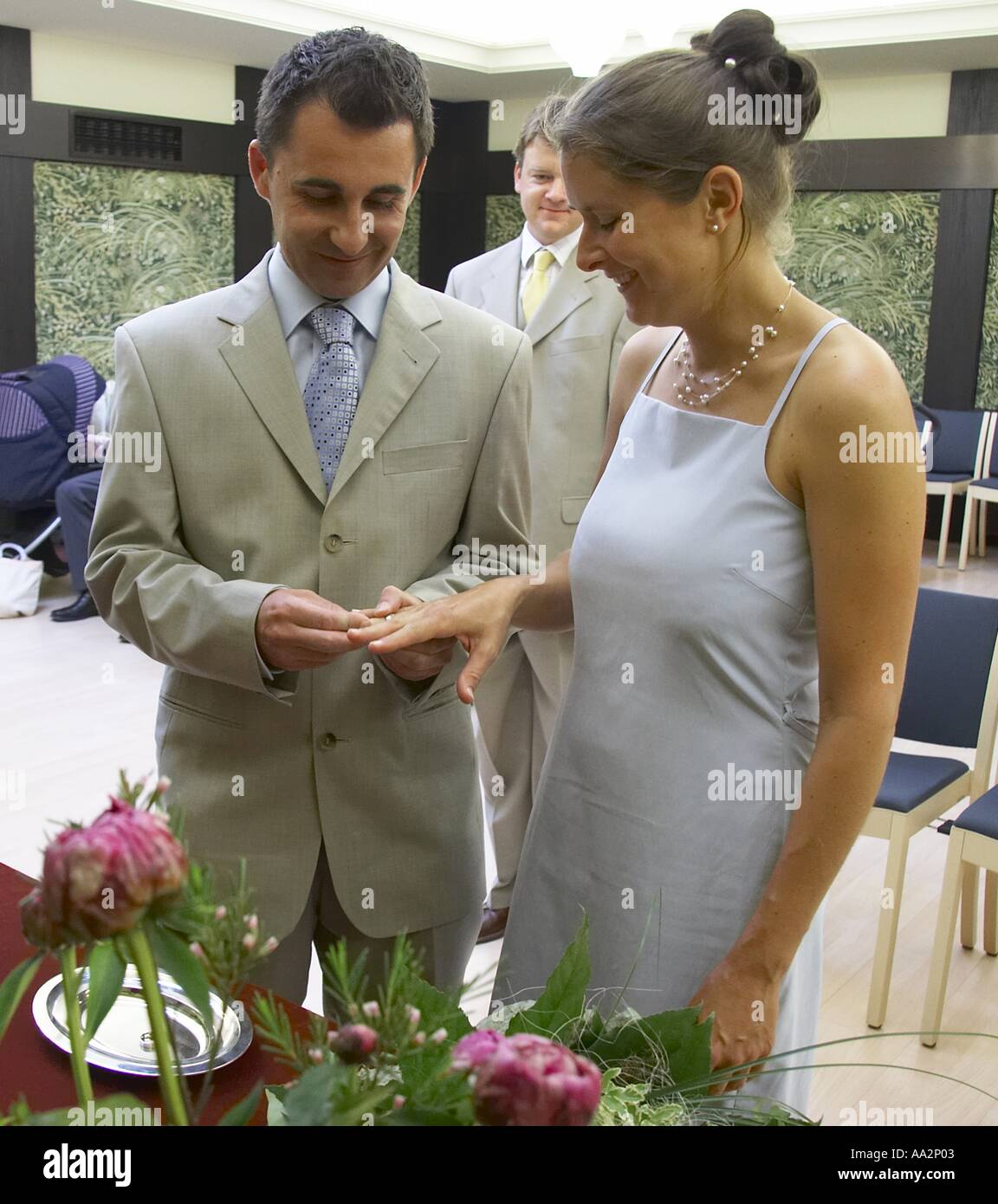 bridal couple exchanging rings Stock Photo - Alamy