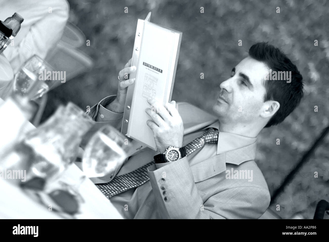 man reading the menu Stock Photo - Alamy