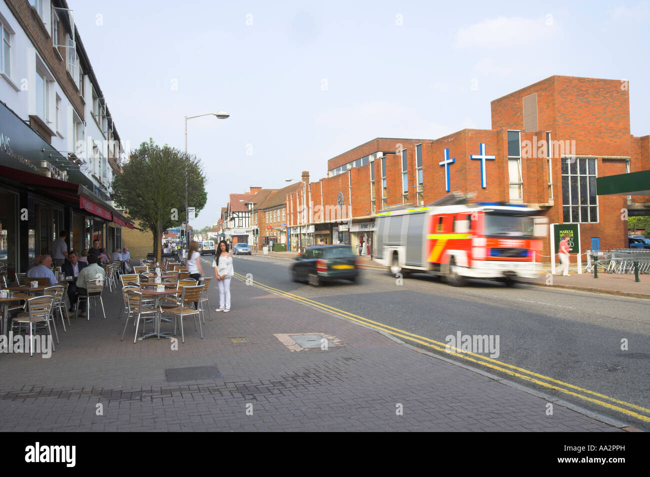 Fire Engine passing through Gerrards Cross Stock Photo - Alamy