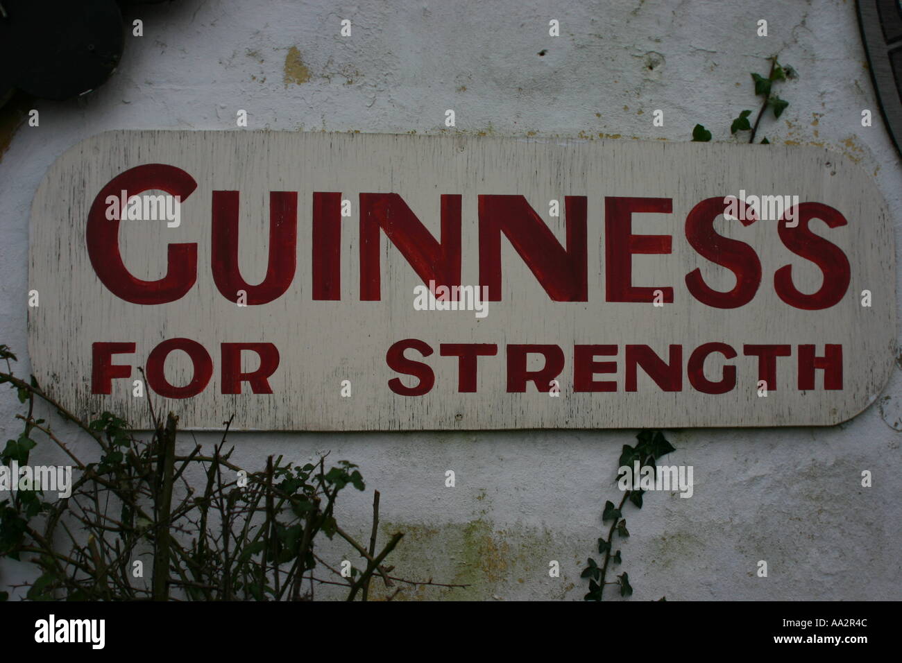 sign 'Guinness for strength' Stock Photo - Alamy