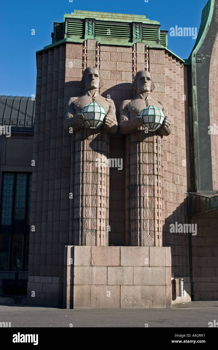 Lantern Carrier statues in front of main Railway Station Helsinki ...