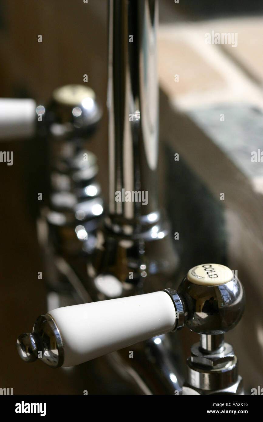 Modern chrome kitchen taps Stock Photo - Alamy