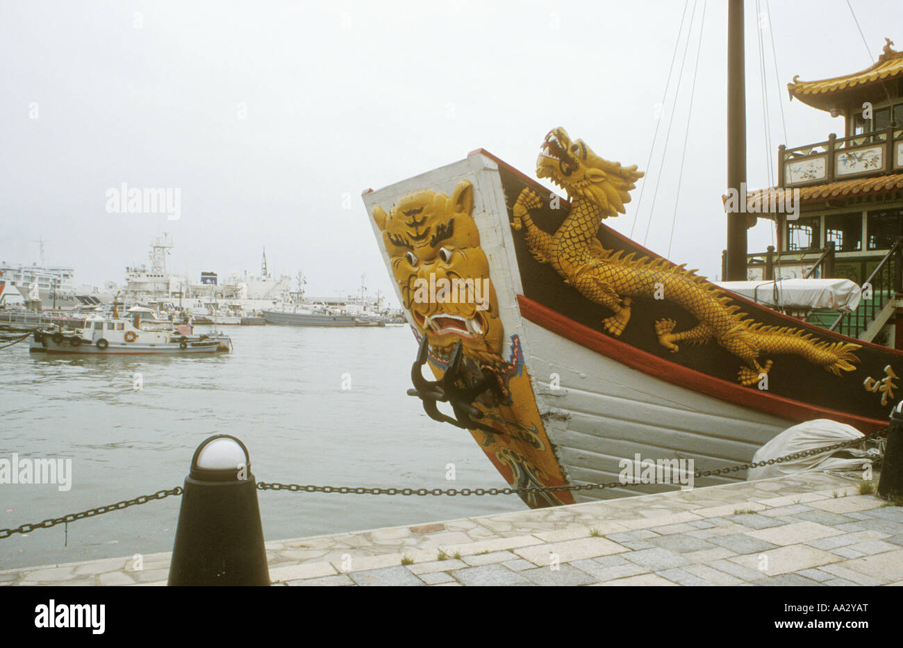 Ornate prow of traditional wooden Chinese dragon boat,floating ...
