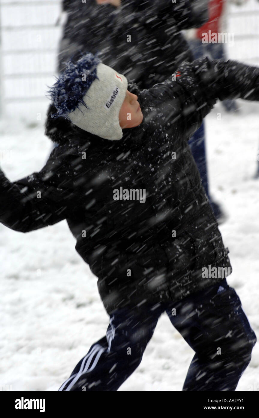 snowball fight snowing snow winter wintry weather cold freezing frozen ...