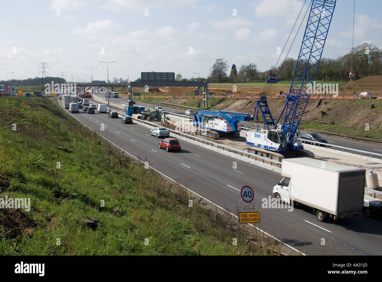 M1 widening scheme between junctions 6A & 10 Stock Photo - Alamy