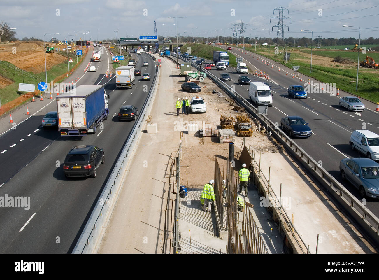 M1 widening scheme between junctions 6A & 10 Stock Photo - Alamy