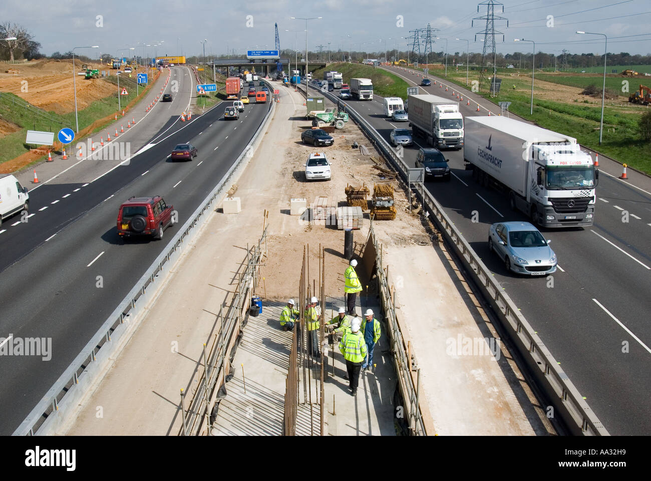 M1 widening scheme between junctions 6A & 10 Stock Photo - Alamy