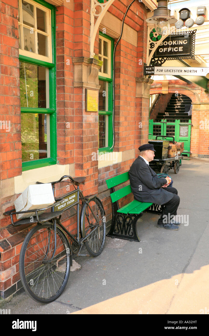 Station Porter Takes a Break at Rothley on the GCR Stock Photo - Alamy