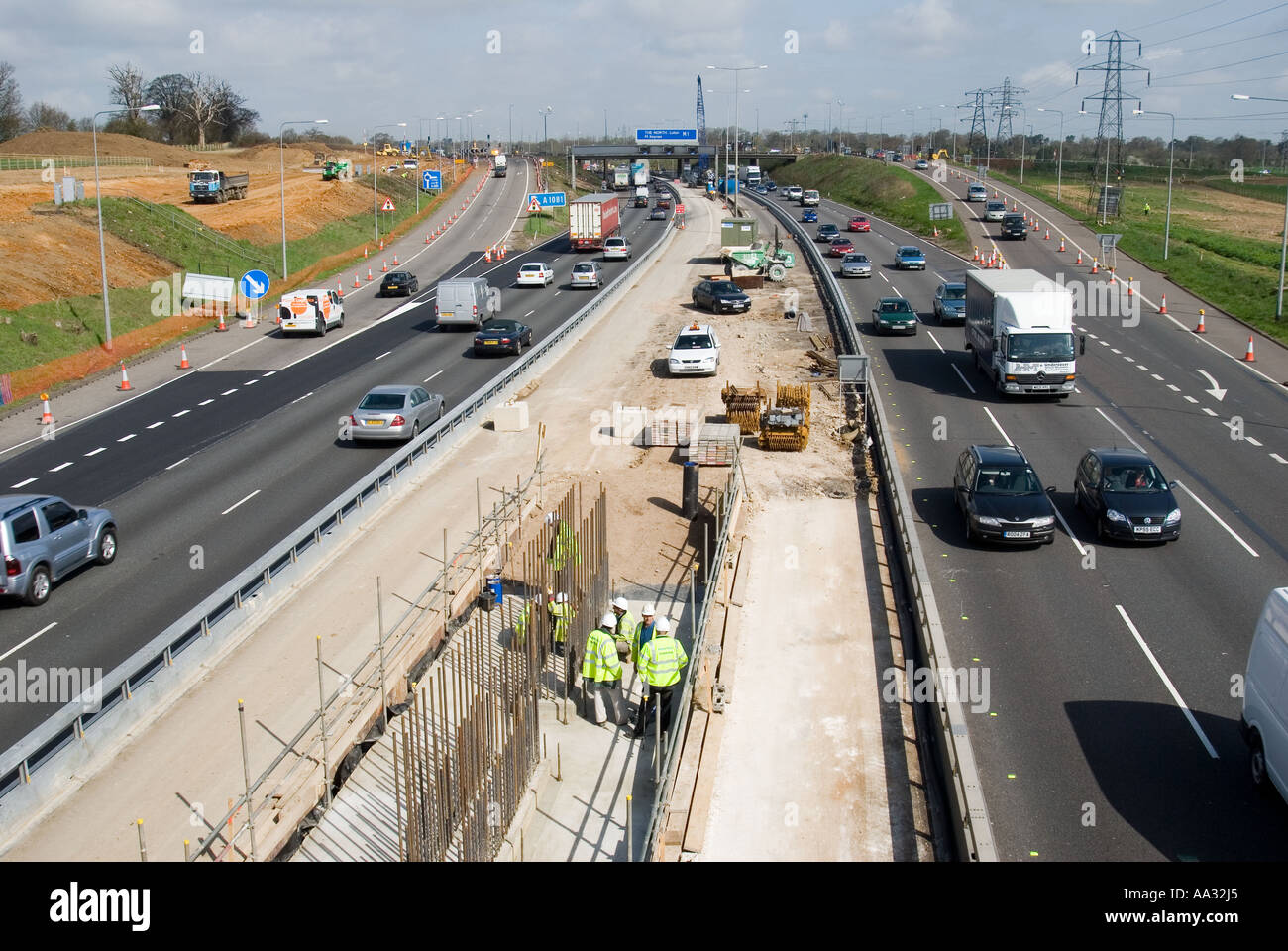 M1 widening scheme between junctions 6A & 10 Stock Photo - Alamy