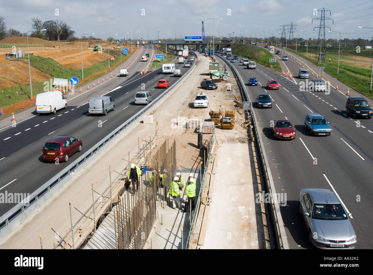 M1 widening scheme between junctions 6A & 10 Stock Photo - Alamy