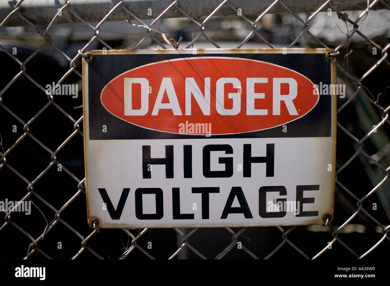 Danger High Voltage sign warning of possible electric shock Stock Photo ...