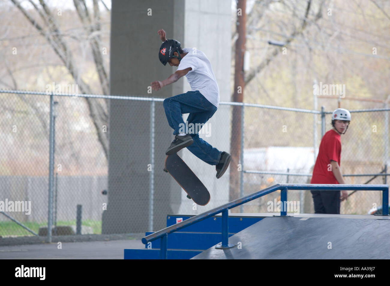 School boy jumping off hi-res stock photography and images - Alamy