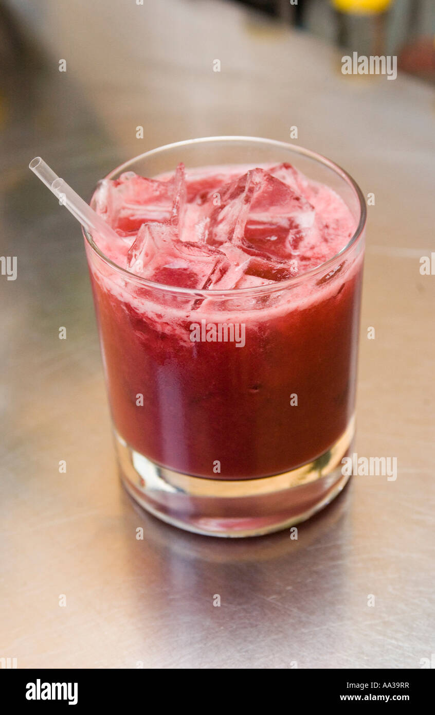 Red drink with vodka and cranberry juice on the rocks Stock Photo - Alamy