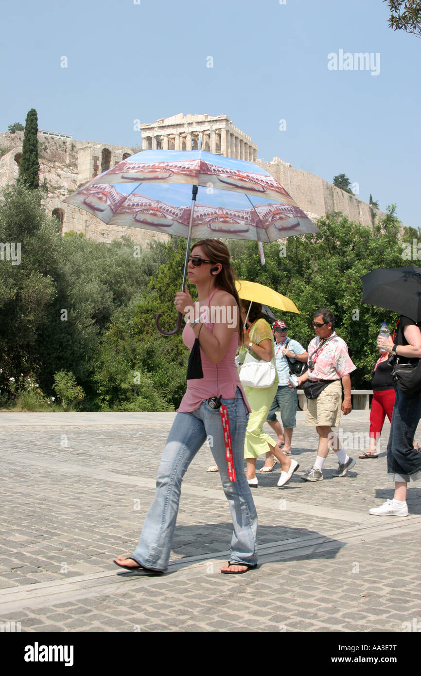 Tourist girl under Acropolis, heatwave Athens Greece Acropolis 21 June ...