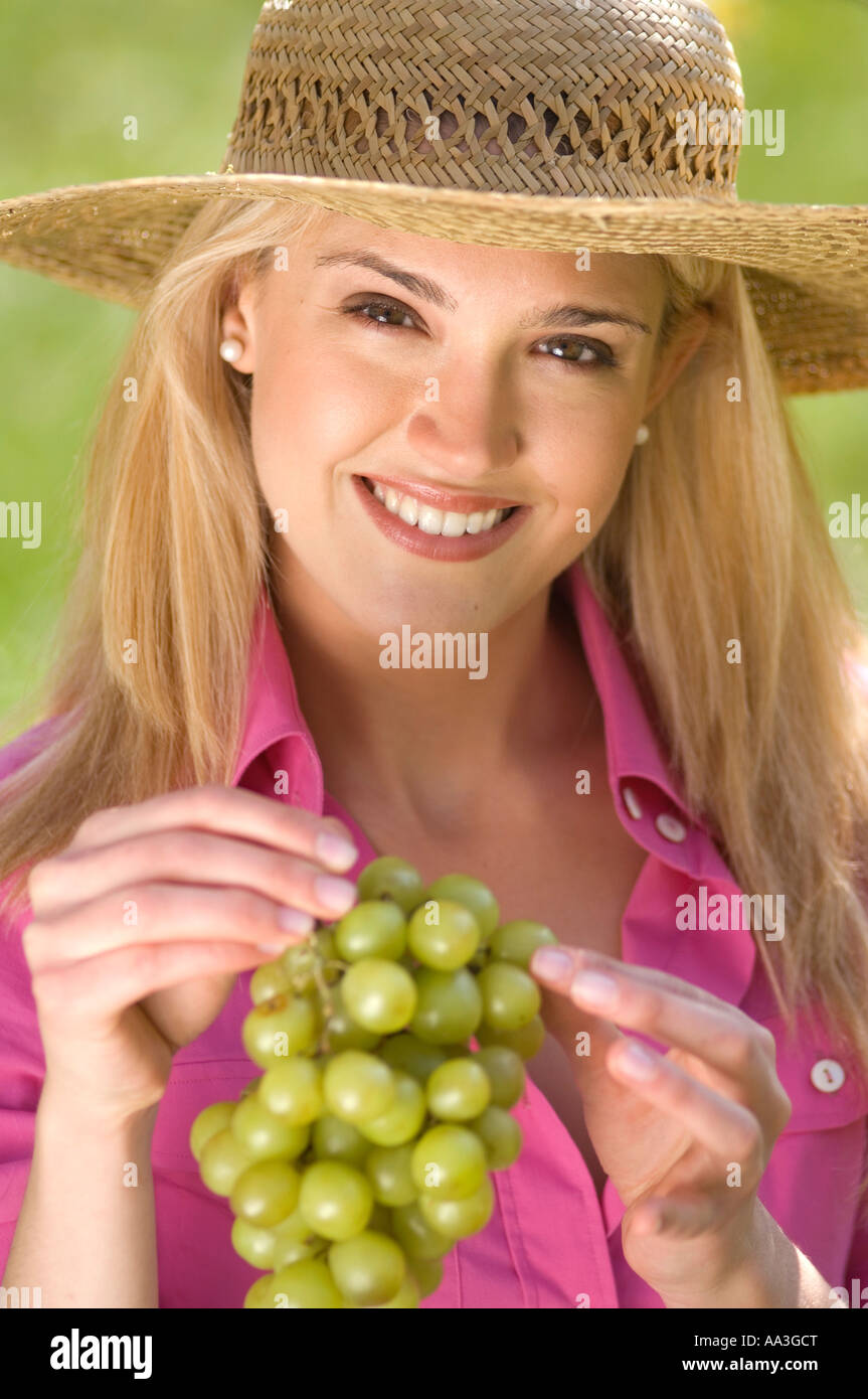 young woman with grapes Stock Photo - Alamy